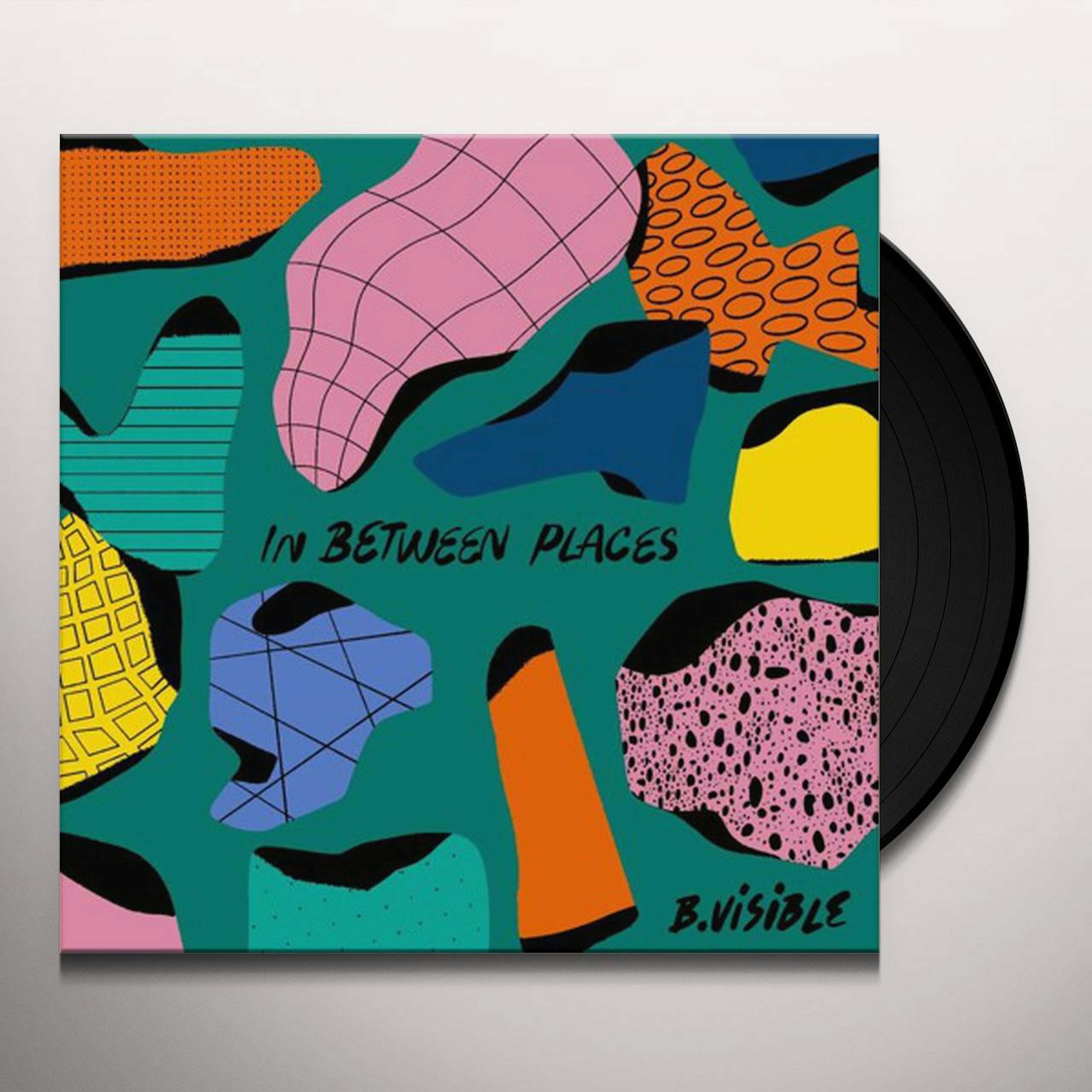 B.Visible IN BETWEEN PLACES Vinyl Record